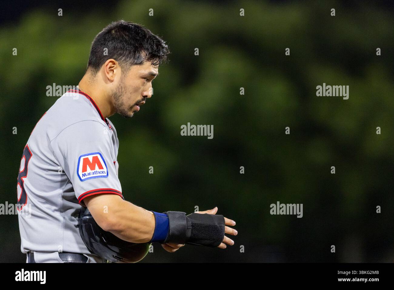 Cleveland Guardians' Steven Kwan gets ready to go to the outfield ...