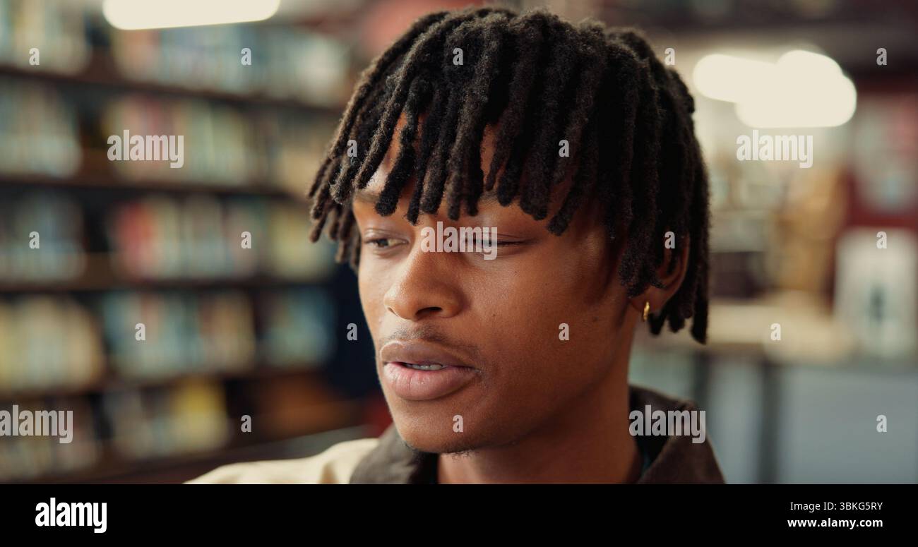 Thinking, black man and student for education in library for reflection ...