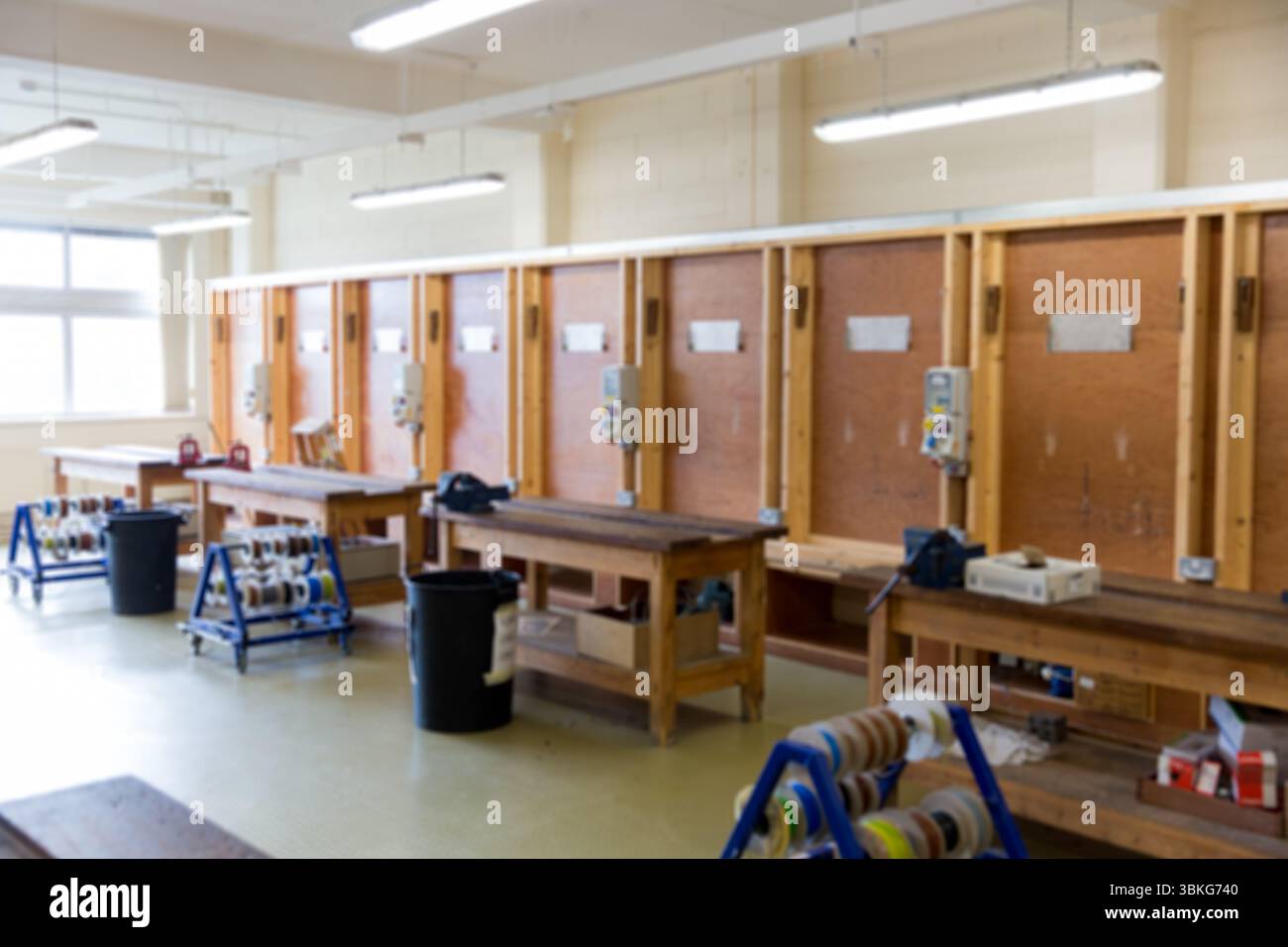 Flat design woodshop is showing benches with vices, wall-mounted tool ...