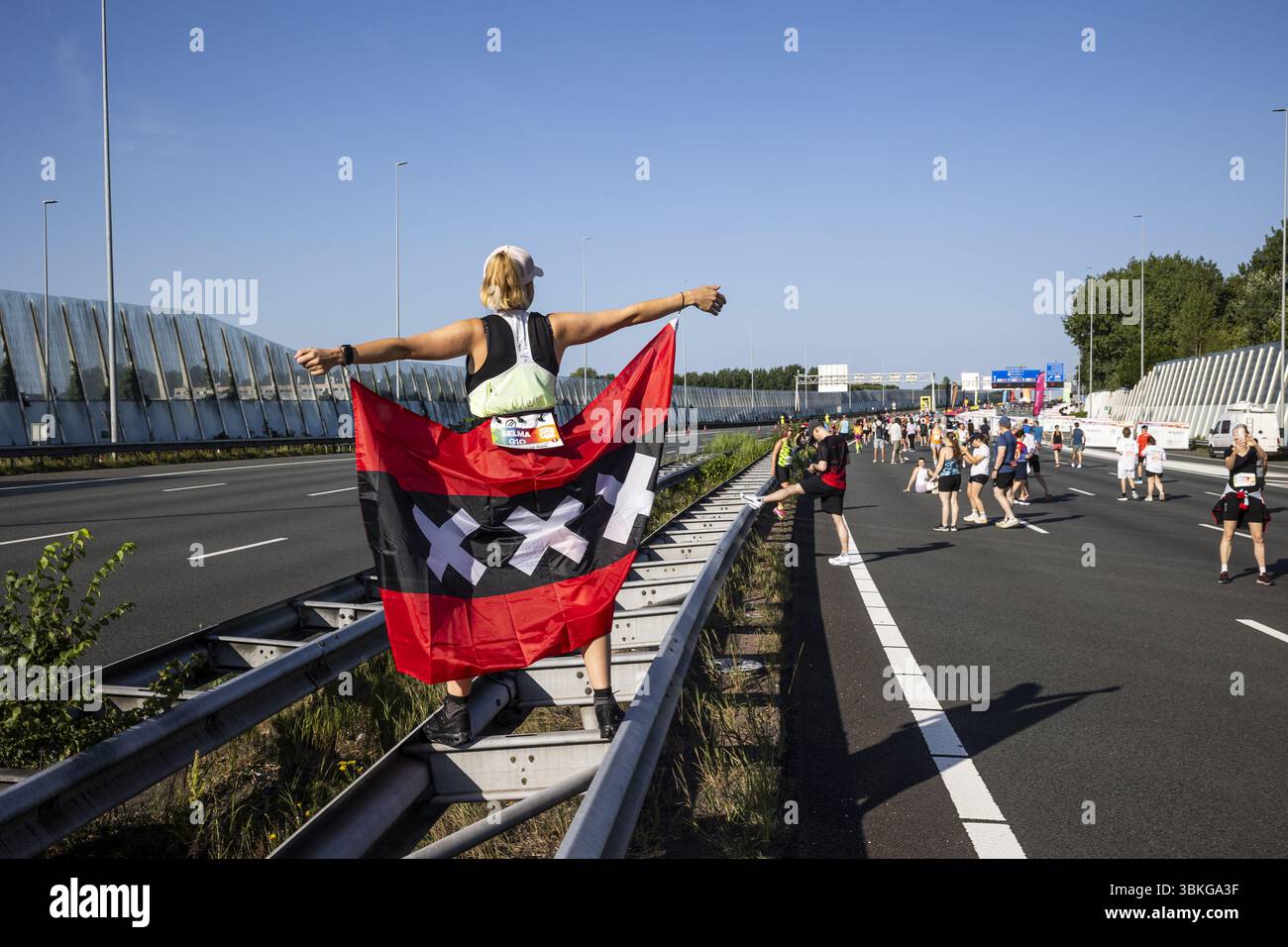 AMSTERDAM - Participants of the Run On the Ring on the car-free Ring ...