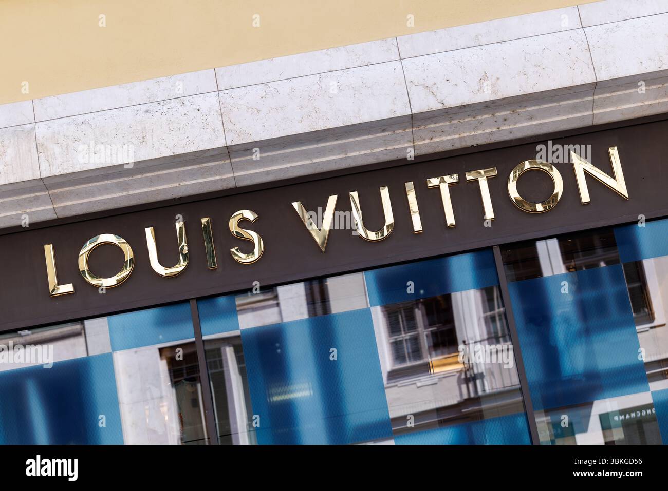 19 June 2025, Bavaria, Munich: The lettering and brand logo of Louis Vuitton can be seen on the ...