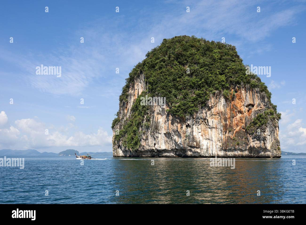 Rock island covered with tropical forest in Andaman sea, Krabi Province ...