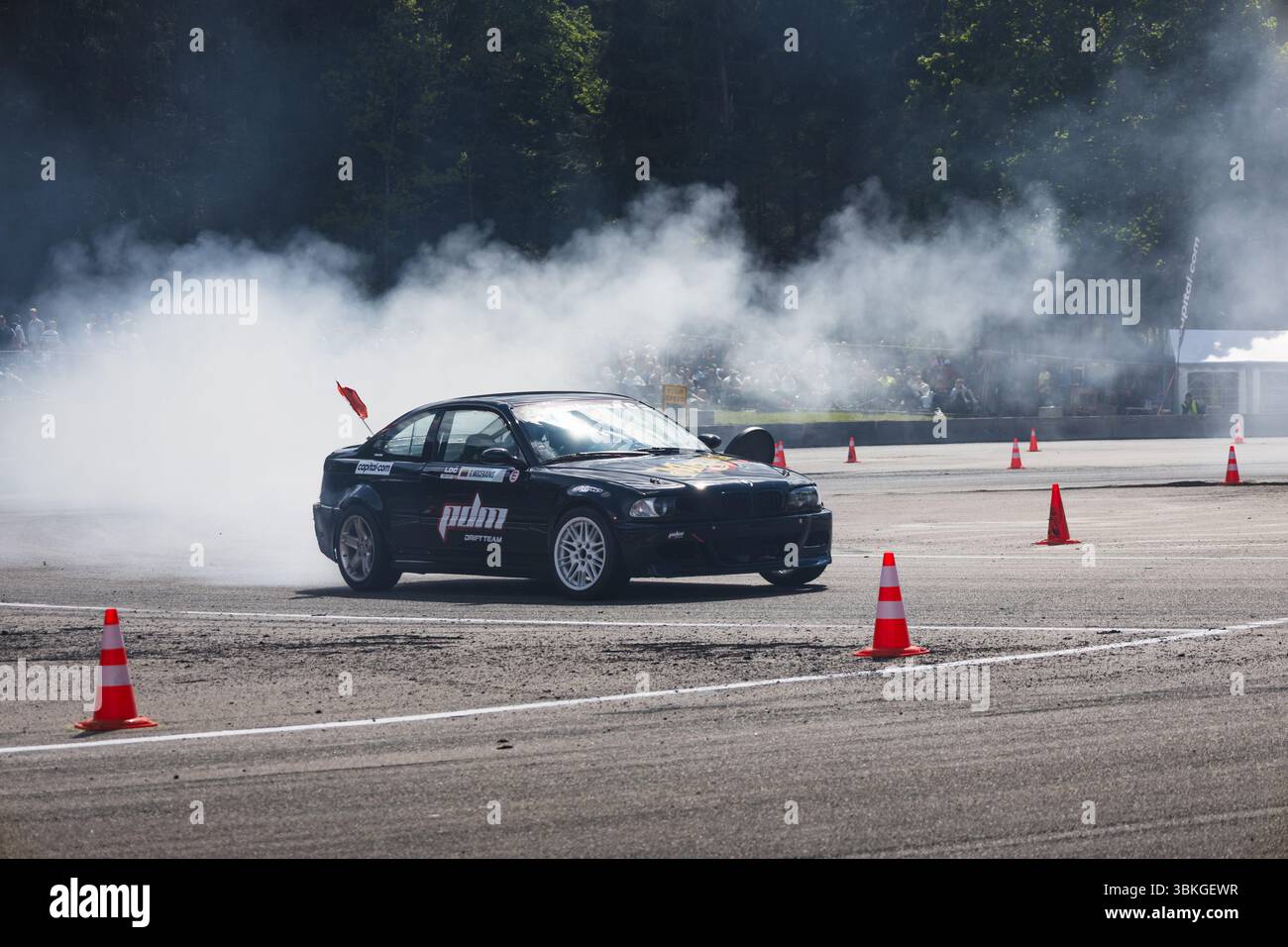 Drift Car Sliding Through Smoke on Track During Motorsport Event ...