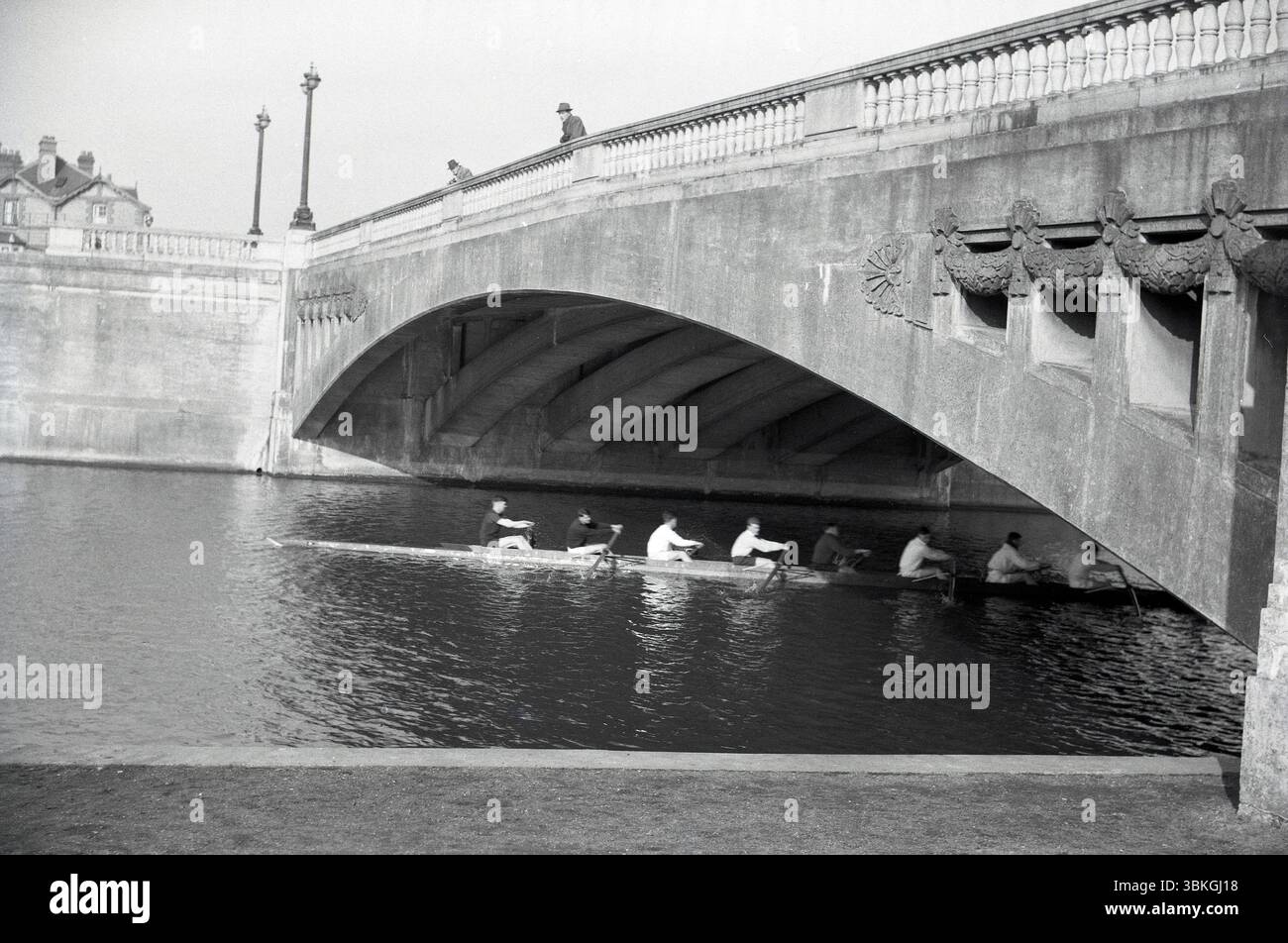 1960s, historical, university students in a rowing boat training on the ...
