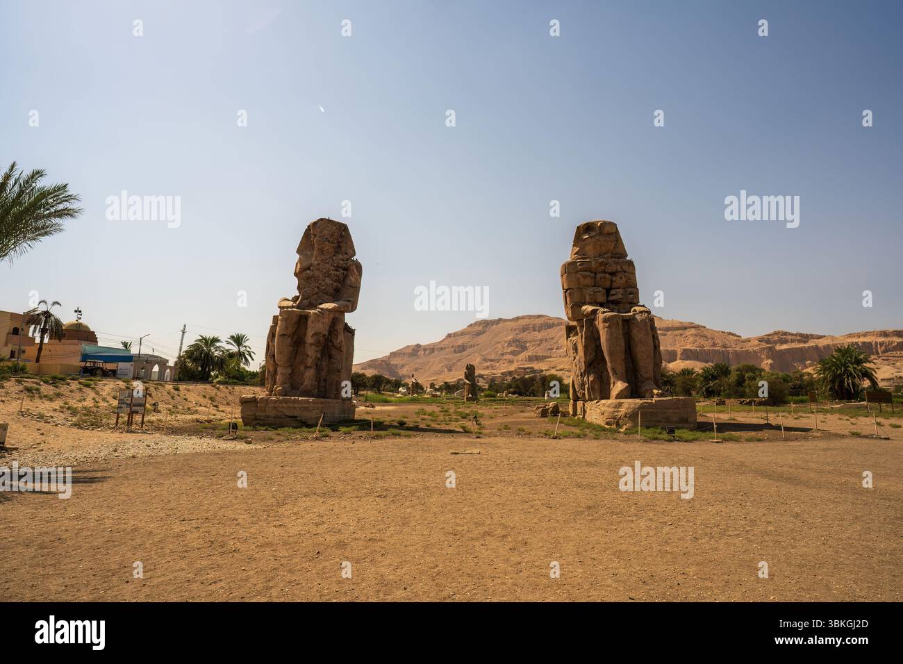 Ancient Colossi of Memnon statues in Luxor, Egypt - massive pharaonic ...
