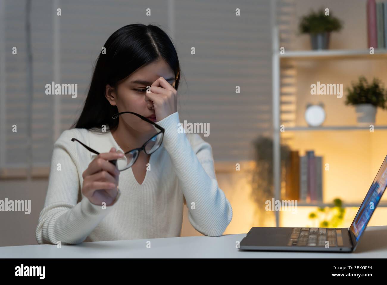 Eye problems, Asian women with tired and irritated eyes, eye rubbing ...