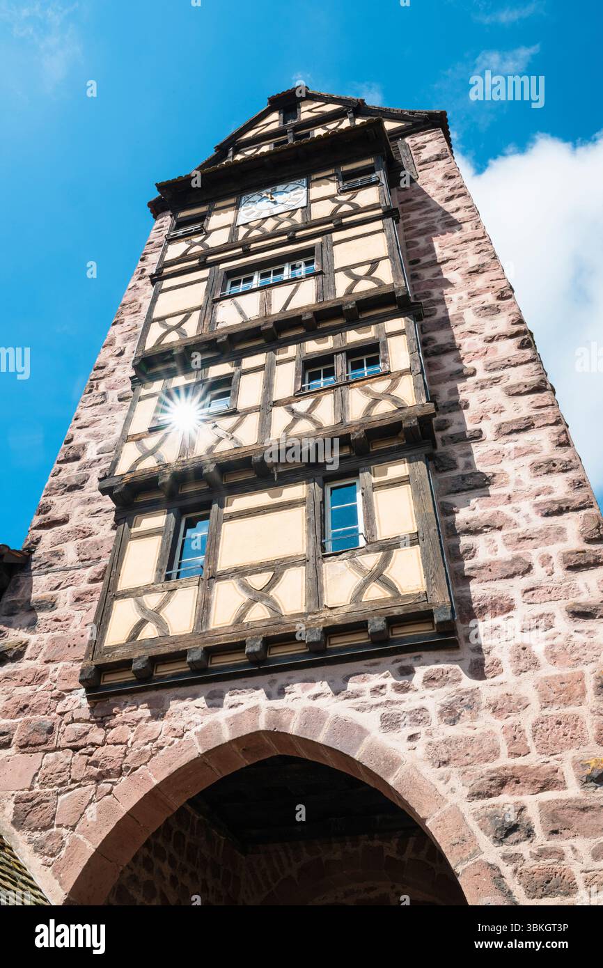 The sun is reflected in a window of the medieval Dolder defence tower ...