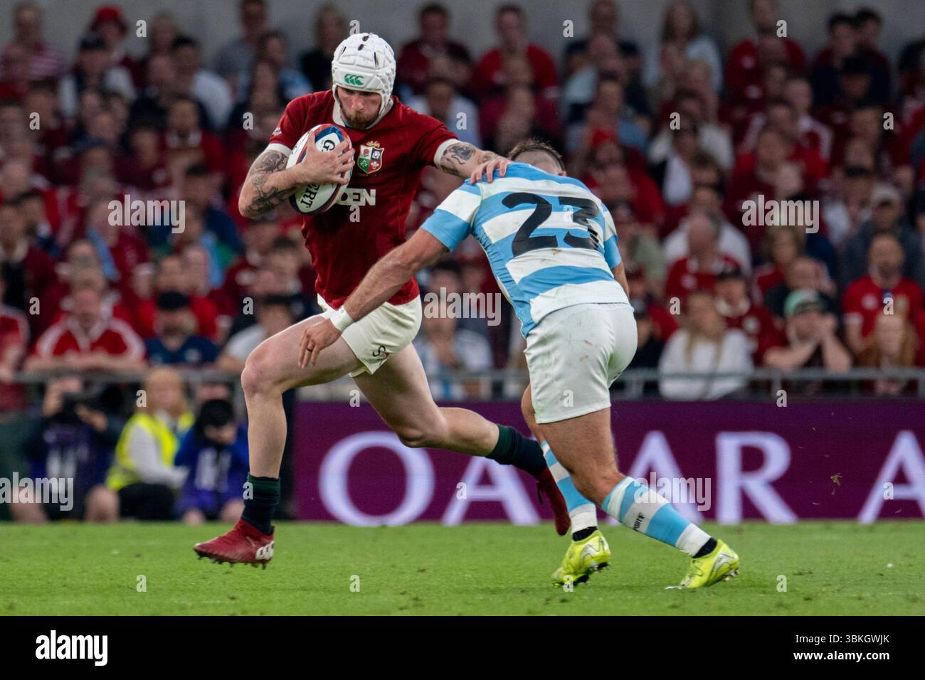 Mack Hansen of Lions tackled by Santiago Cordero of Argentina during ...