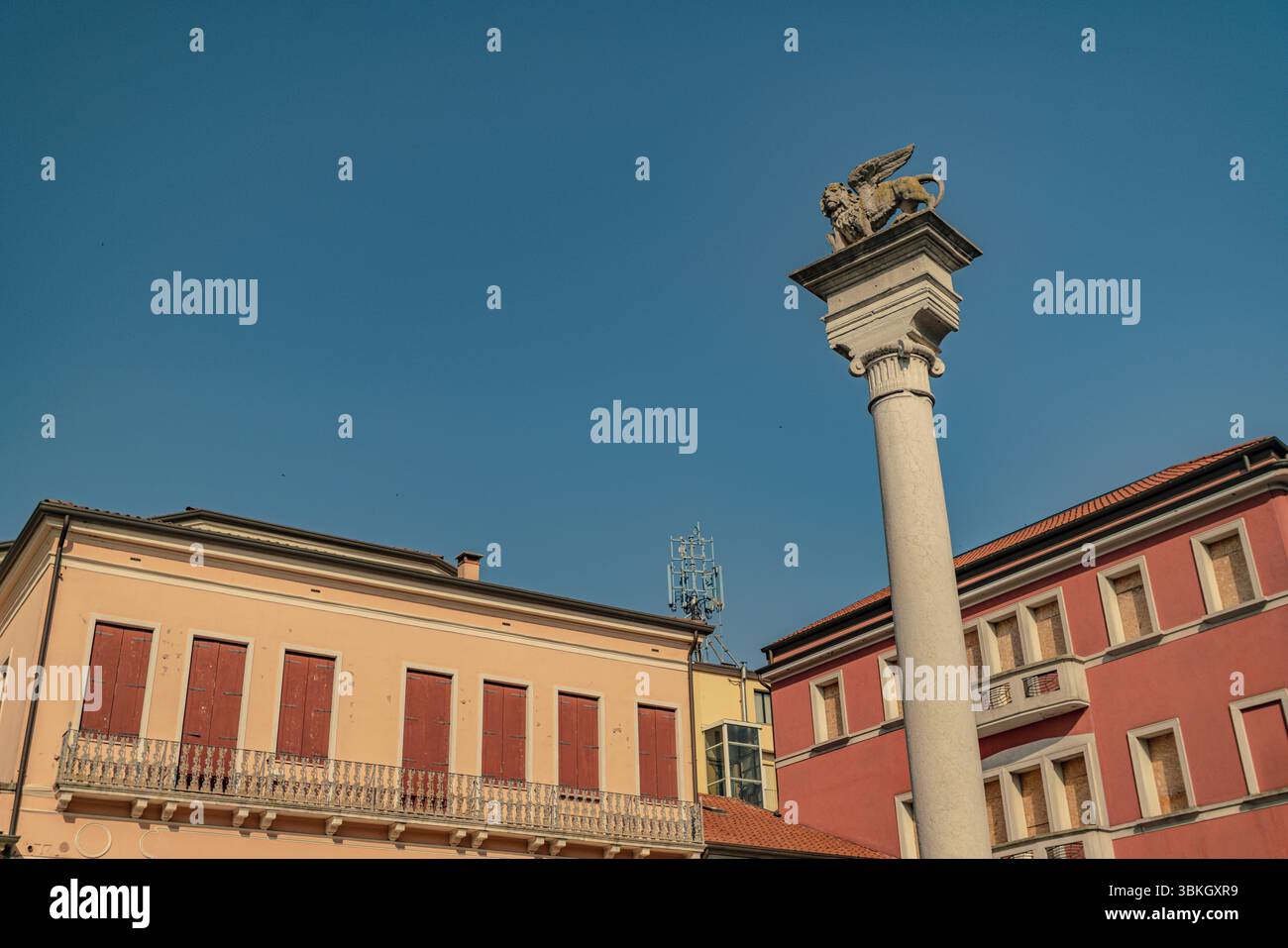 Rovigo, italy 21 june 2025, white marble column topped with the winged ...