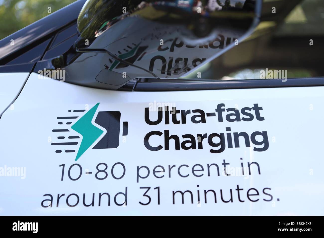 EV charging ultra-fast charging of EV vehicle percent Stock Photo - Alamy