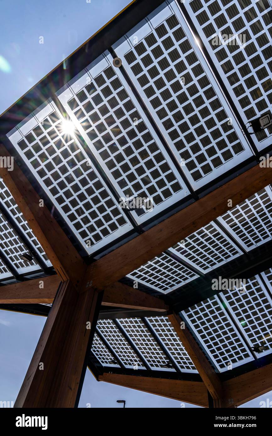 Transparent solar roof of the electric charging station on the grounds ...