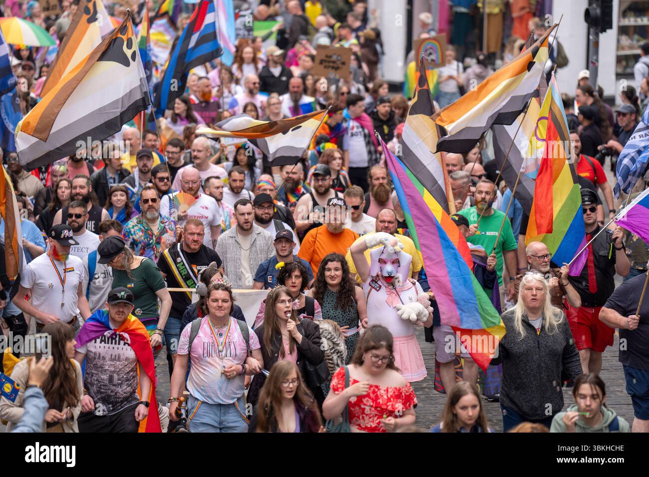 People take part in the Pride Edinburgh 2025 parade through Edinburgh ...