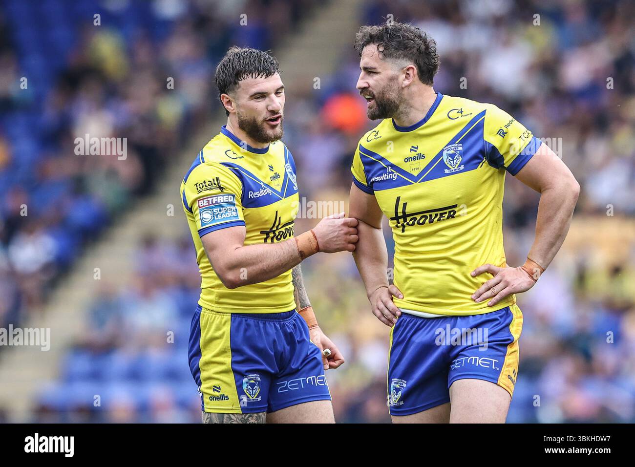 Warrington, United Kingdom, 21st June 2025. Toby King of Warrington Wolves and Connor Wrench of ...