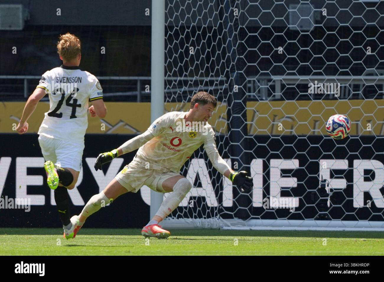 Borussia Dortmund goalkeeper Gregor Kobel is can't stop a goal by ...
