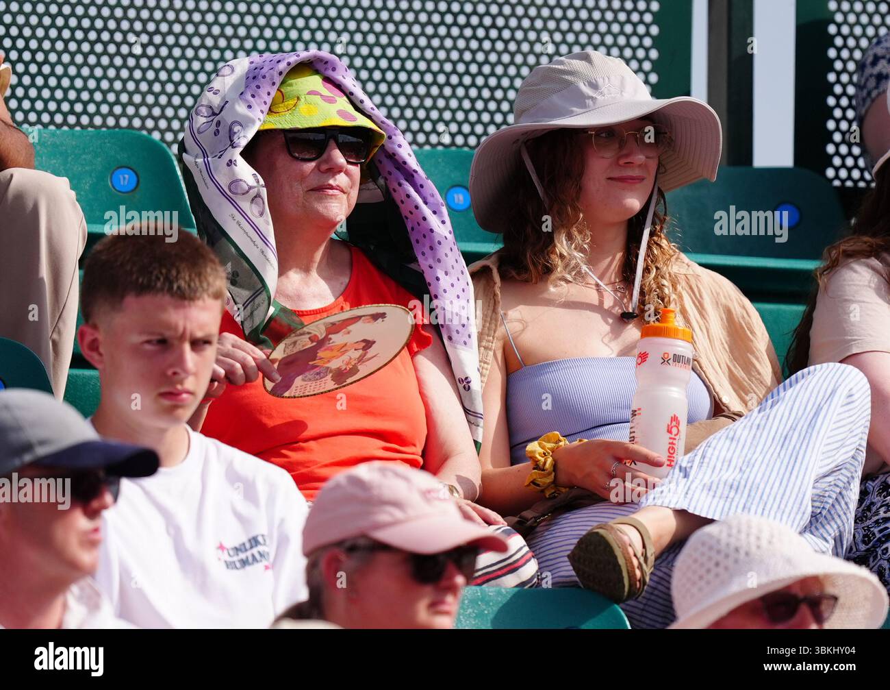 Spectators shelter from the sun during day six of the Lexus Nottingham ...