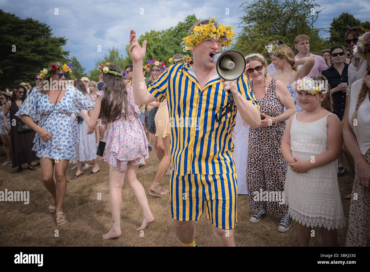 London, UK. 21st June, 2025. Swedish Midsummer is celebrated in Hyde ...