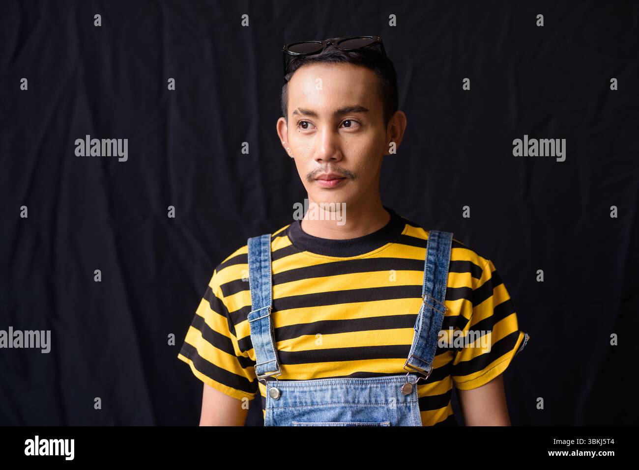 Portrait of nonbinary genderfluid young Asian gay man Stock Photo - Alamy