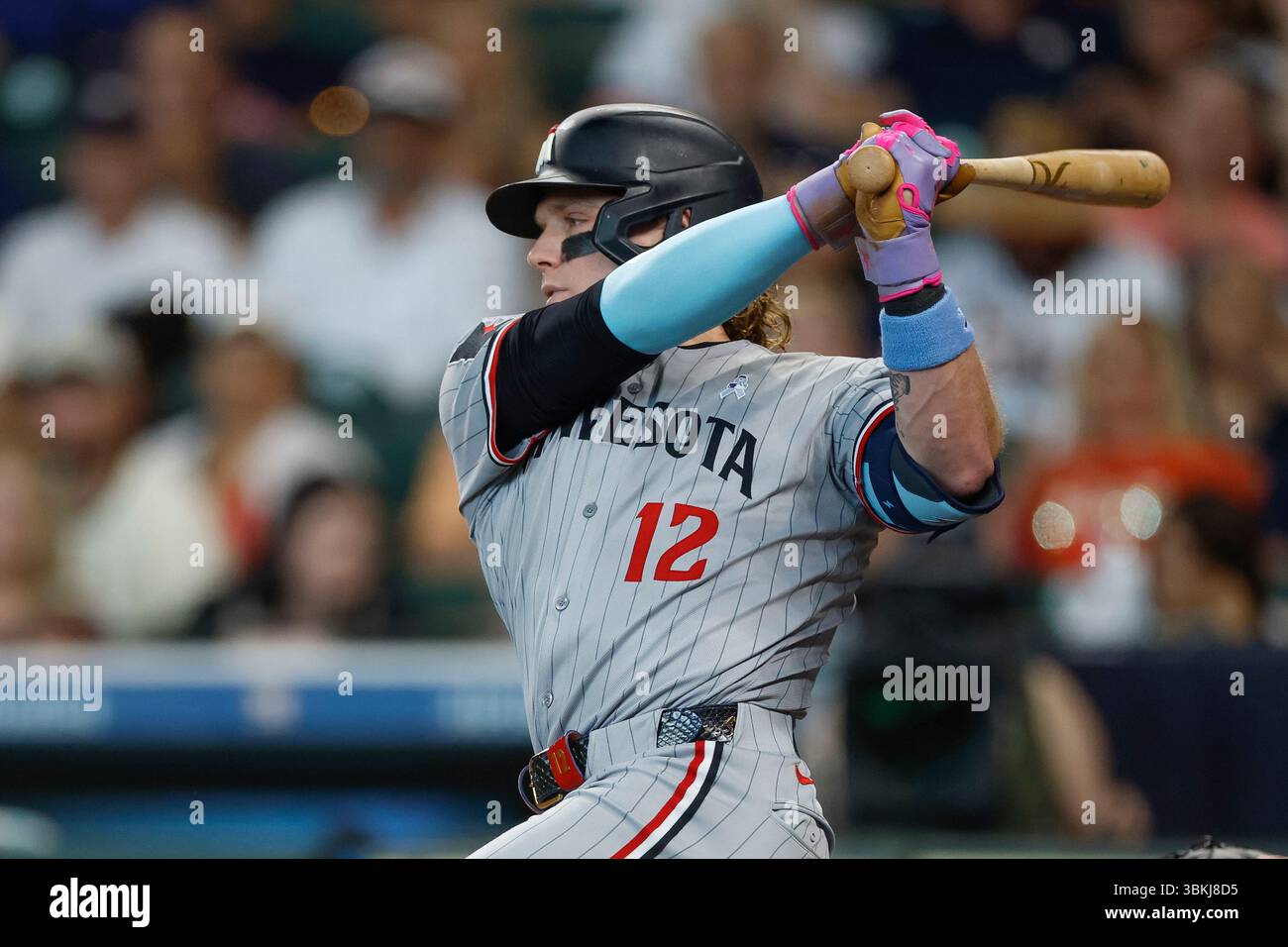 Harrison Bader #12 of the Minnesota Twins swings the bat during a game ...
