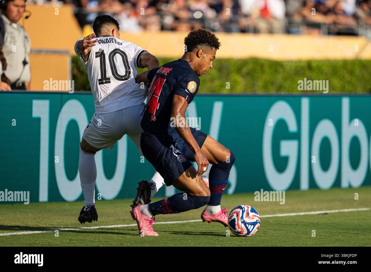 Paris Saint-Germain forward Desire Doue (14) is defended by Botafogo ...