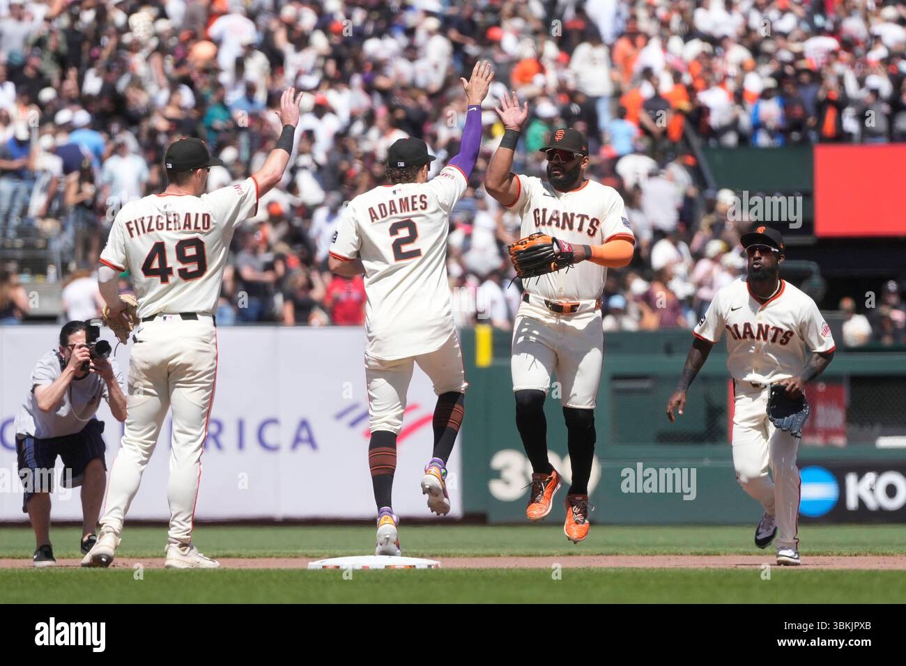 San Francisco Giants' Tyler Fitzgerald, from left, celebrates with ...