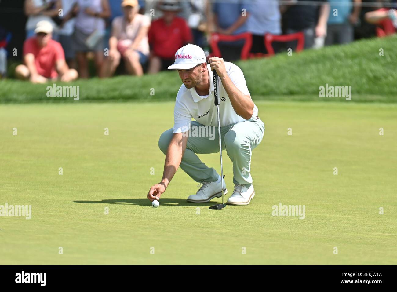 June 21, 2025: Wyndham Clark lines up putt on the 9th green during the ...