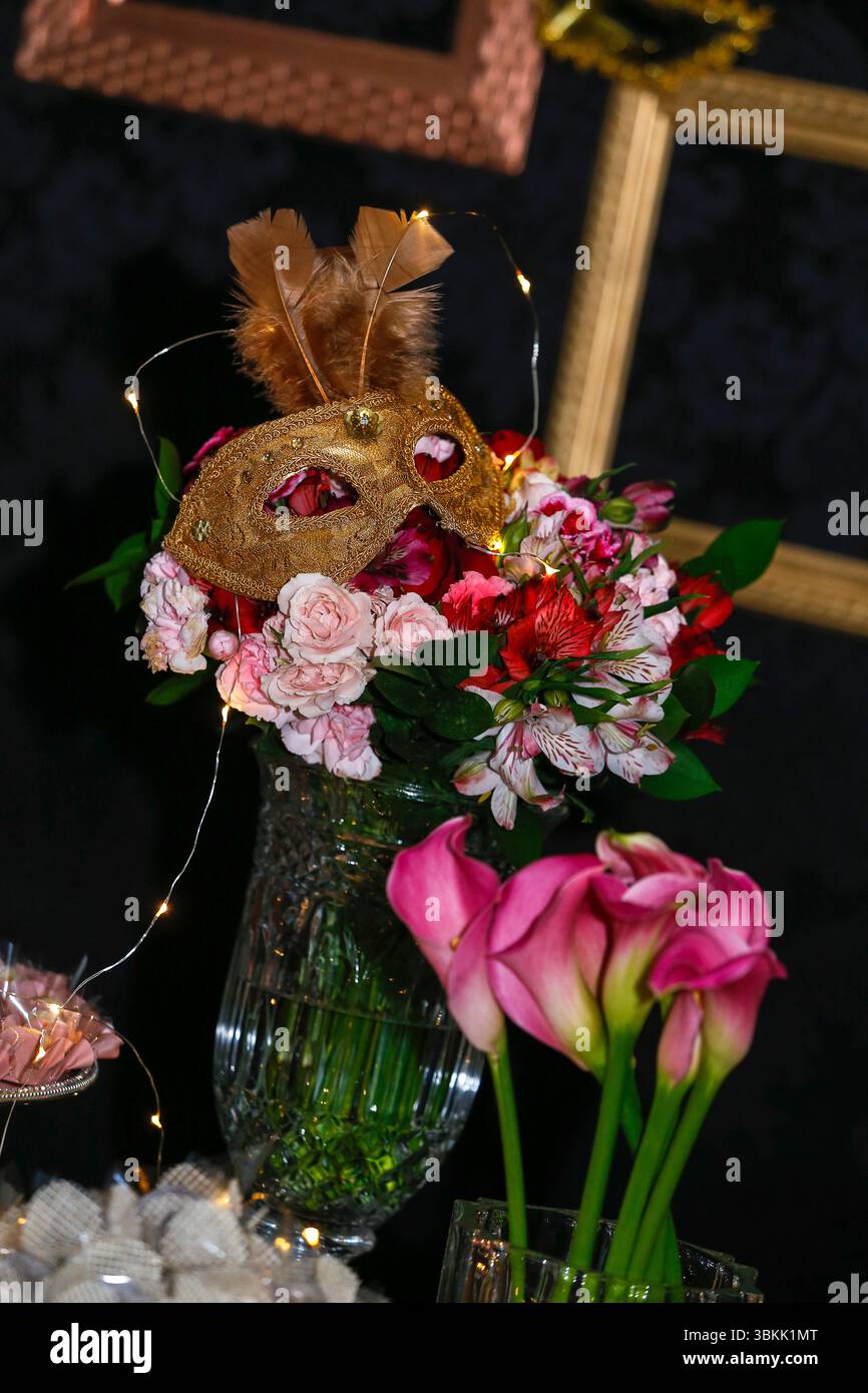 Beautiful floral arrangement with masks in carnival theme style Stock ...