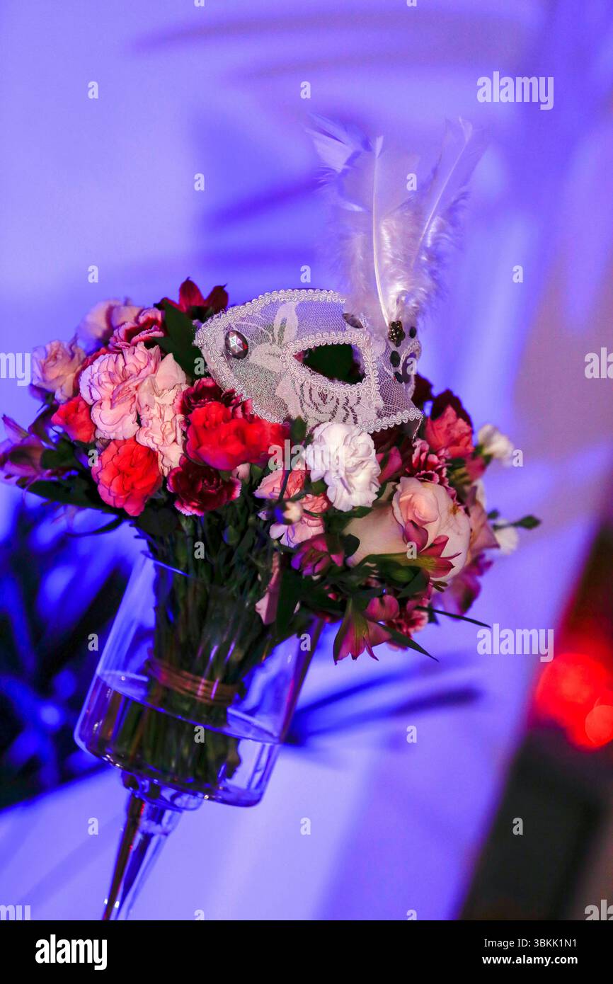 Beautiful floral arrangement with masks in carnival theme style Stock ...