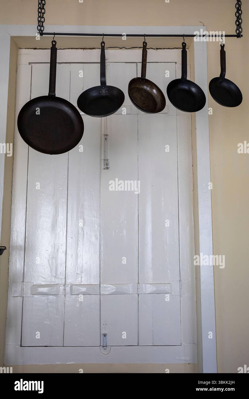 Hanging pans in kitchen hi-res stock photography and images - Alamy