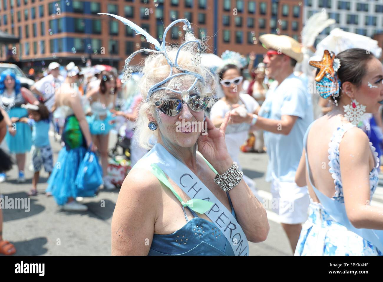 People dressed as mermaids and sea creatures participate in the 43rd ...