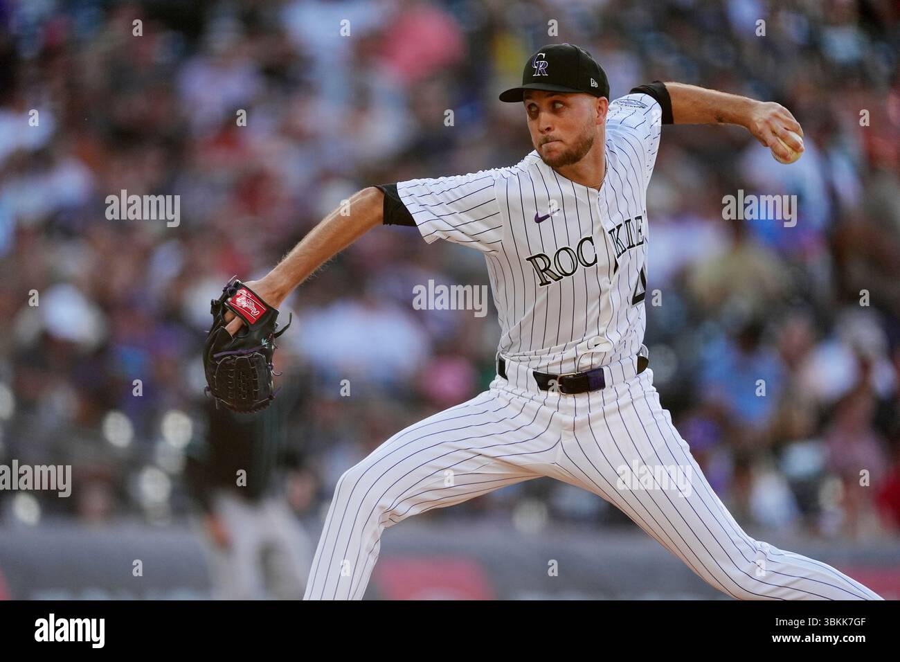 Colorado Rockies starting pitcher Carson Palmquist works against the ...
