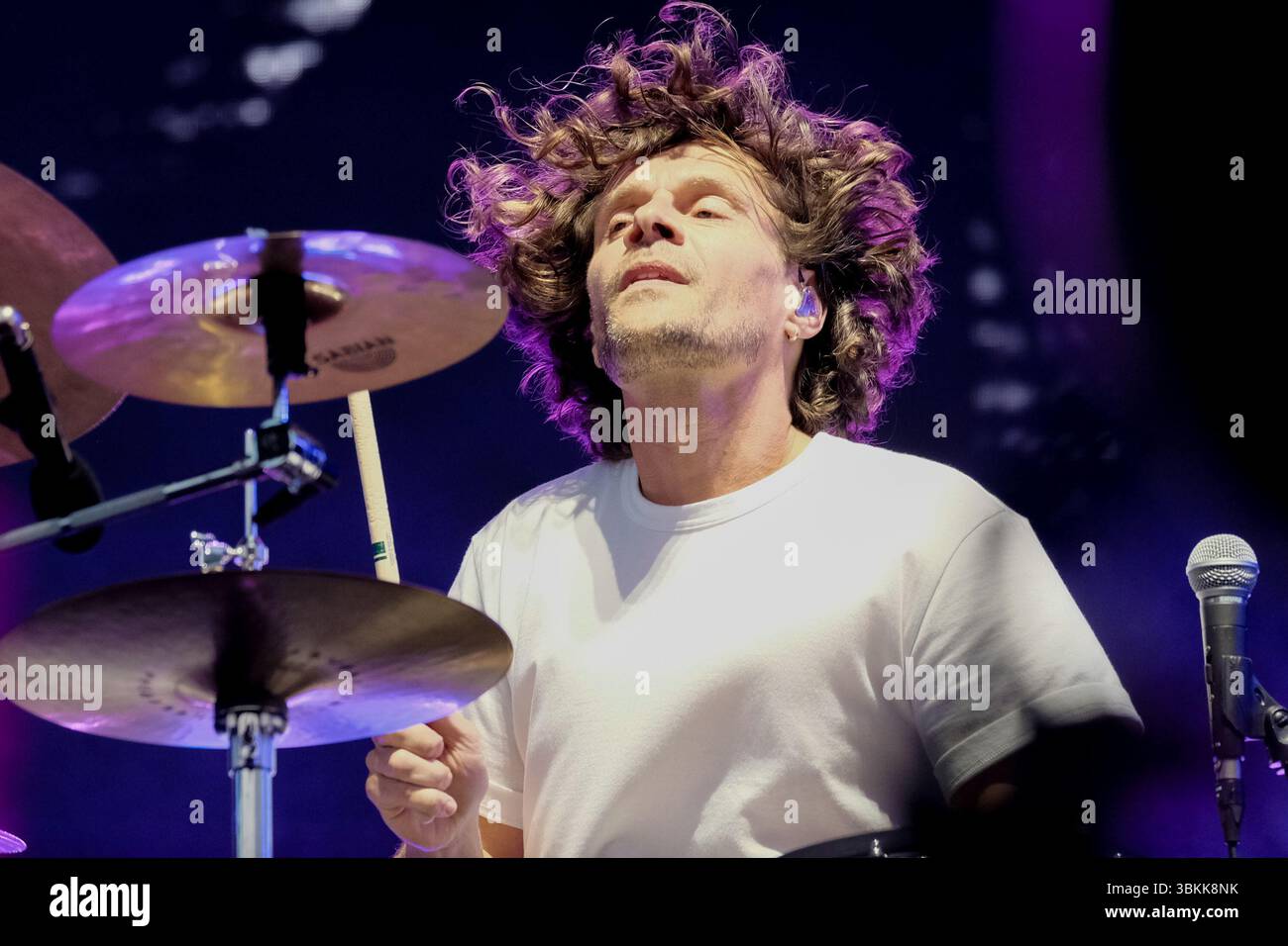 Newport, UK. 21st June, 2025. English drummer Adam Falkner, performing ...