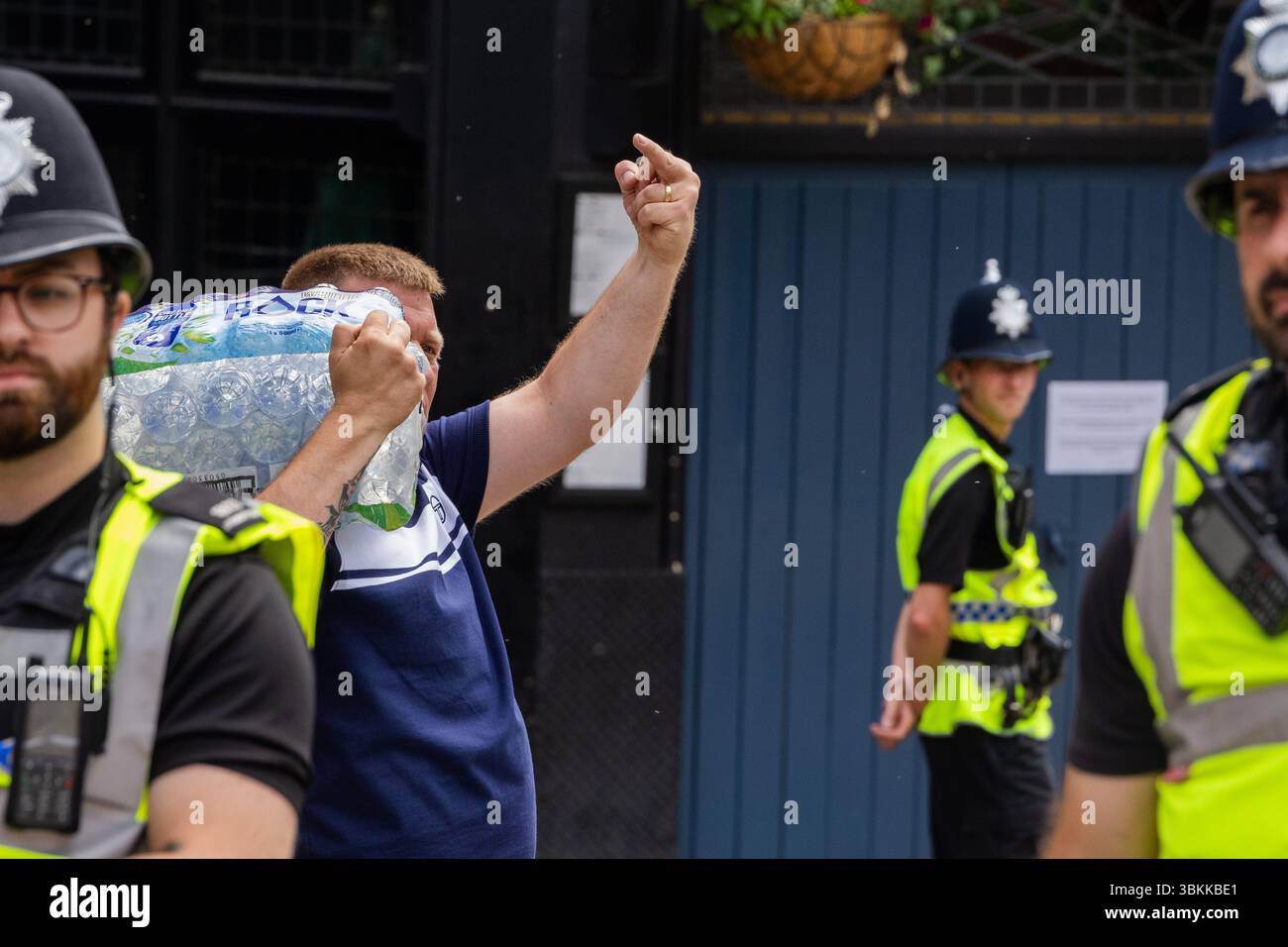 Nottingham, UK. 21 JUN, 2025. Man swears at counter protestors as UKIP ...
