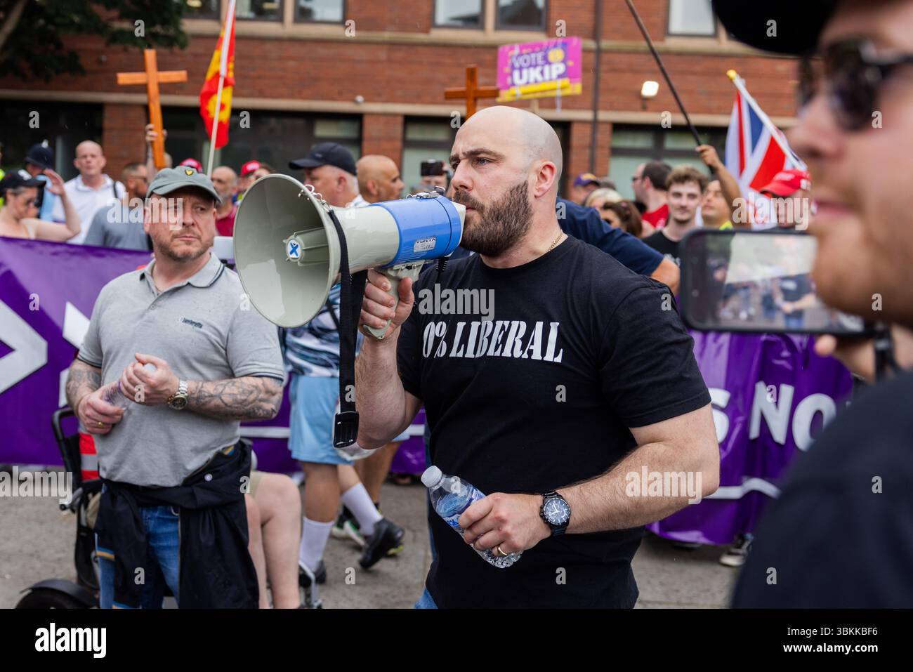 Nottingham, UK. 21 JUN, 2025. Tencoini leads supporters as UKIP held a ...