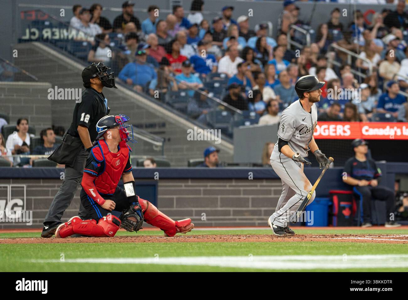 Austin Slater #15 of Chicago White Sox looks the ball after bating ...