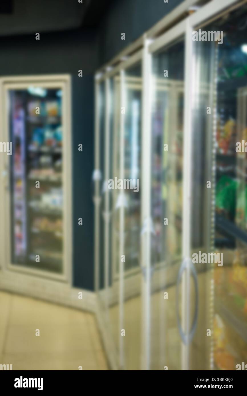 Refrigerated section at supermarket Stock Photo - Alamy