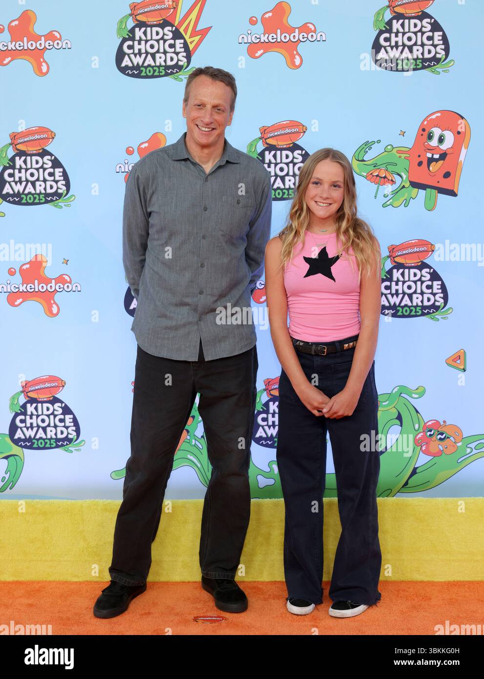 Tony Hawk and Katelyn West attend the 2025 Nickelodeon's Kids' Choice ...