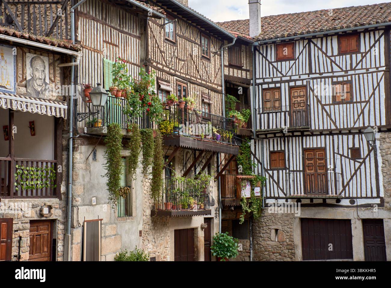 an evocative cobblestone alley in the village of Mogarraz, Salamanca ...
