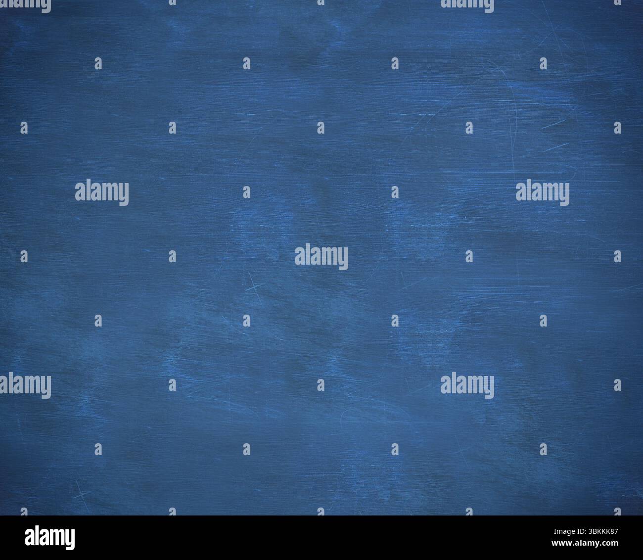 Blue textured surface is showing subtle brush lines and faint scuff ...