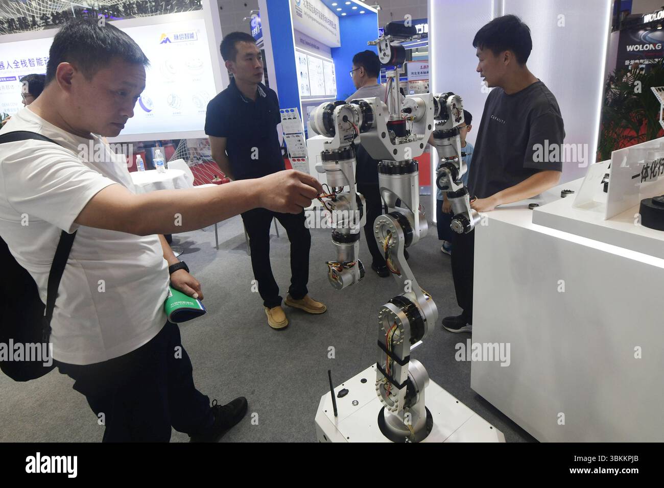 HANGZHOU, CHINA - JUNE 22, 2025 - Visitors are viewing the internal ...