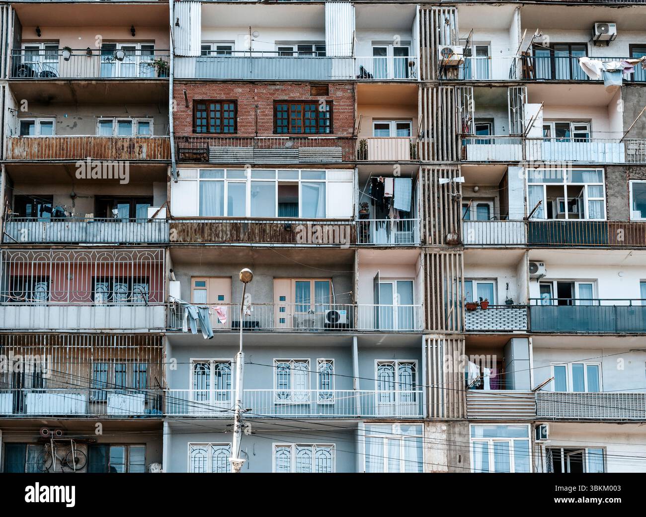 Balconies from 1970s Soviet panel buildings in Tbilisi, Georgia. The ...