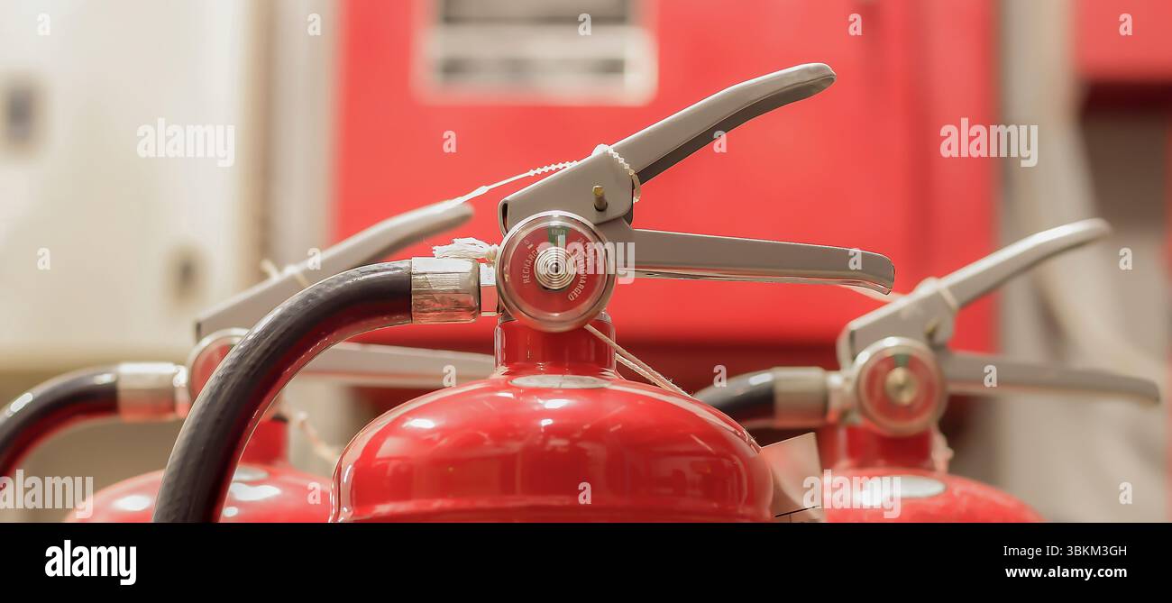 fire extinguishers available in fire emergencies Stock Photo - Alamy