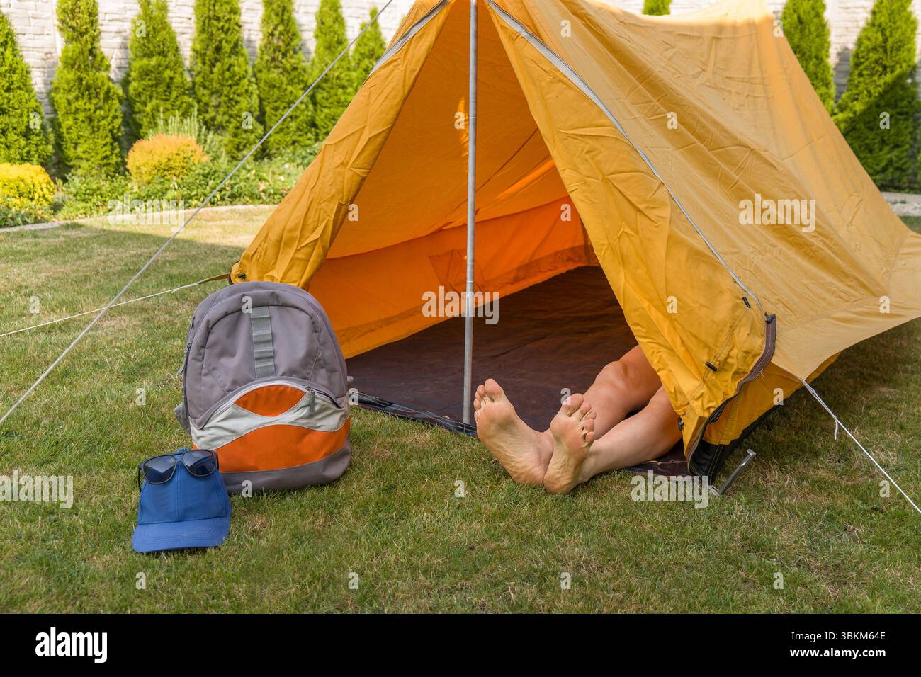 Old retro orange tent from 70s in the house garden Stock Photo - Alamy