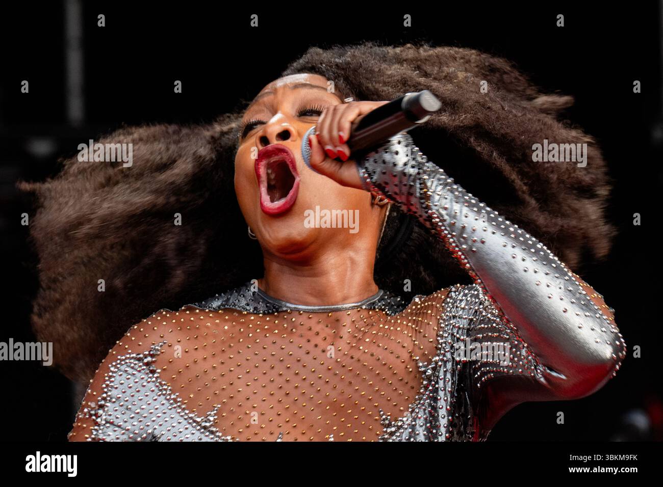 Thetford, UK, 21 June, 2025. Beverley Knight in concert. Pictured left ...