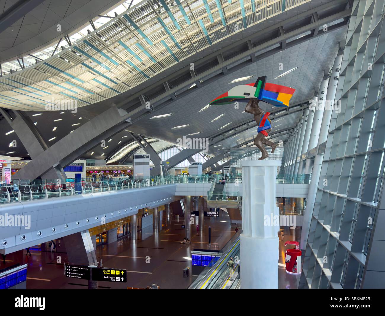 Doha, Qatar - June 21, 2025: The passenger terminal complex of Hamad ...