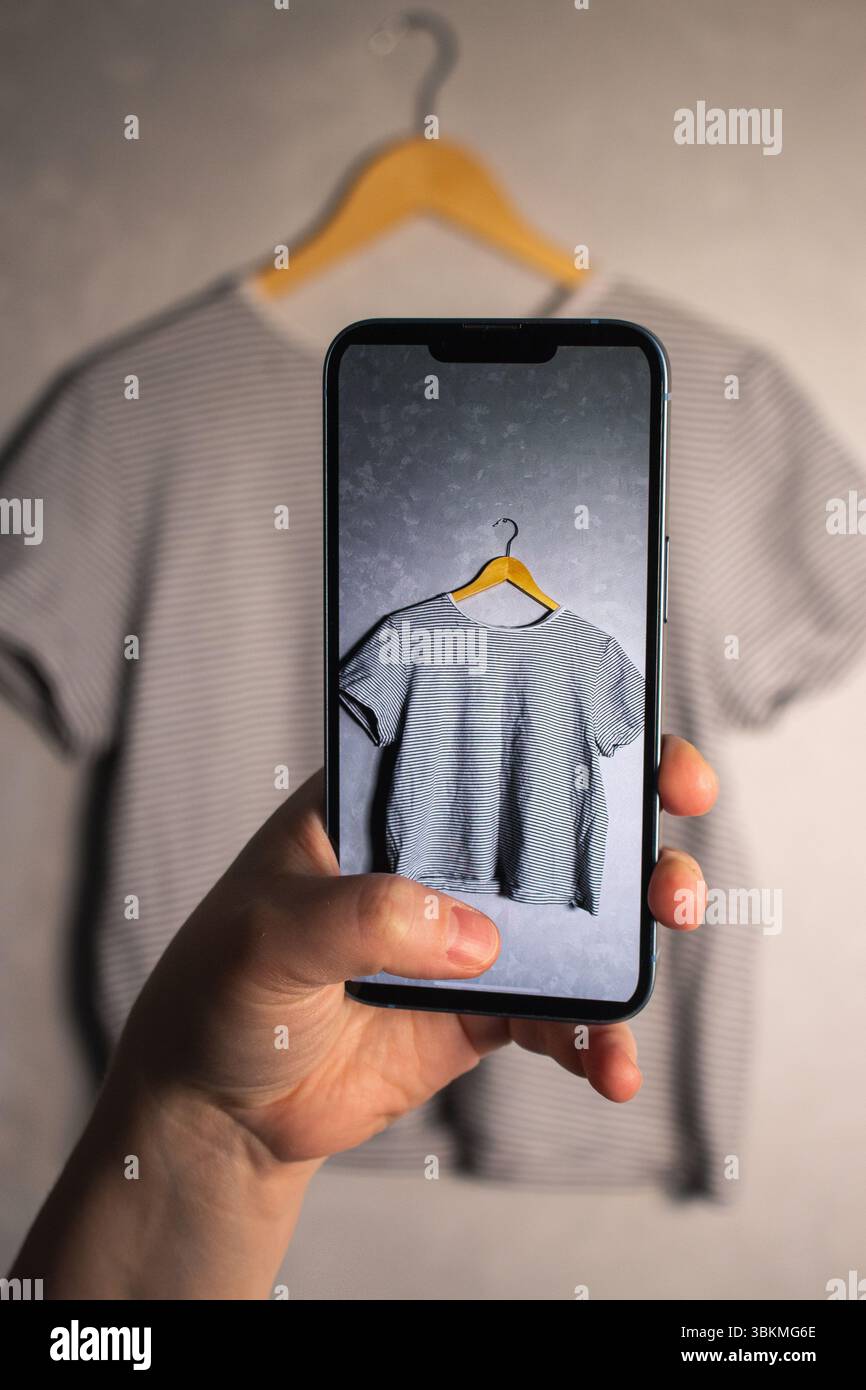 Girl takes pictures of her old wardrobe items to sell secondhand ...