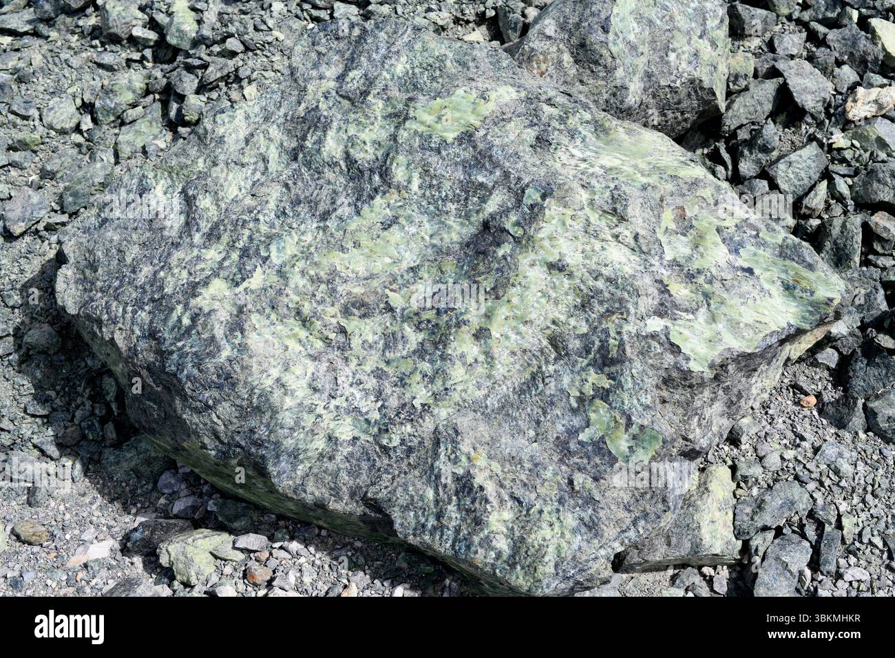 Serpentinite is a metamorphic rock composed mainly of serpentine ...