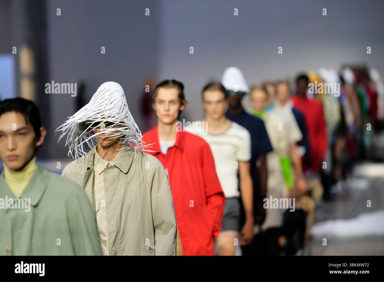 Models wear creations as part of the men's Prada Spring-Summer 2026 ...