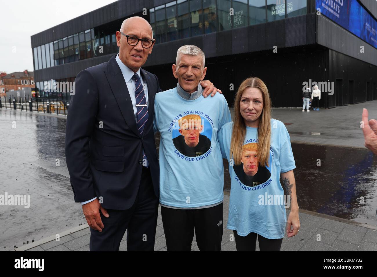 Former footballer Mark Hateley (left) with Neil and Elizabeth McCrimmon ...