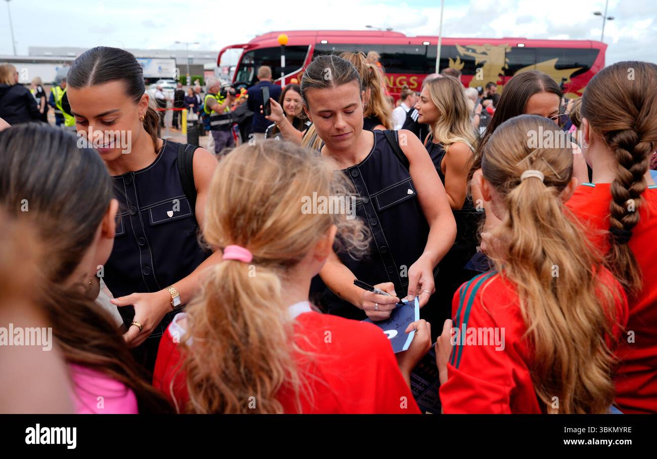 Wales' Hayley Ladd gives a young fan her autograph at Cardiff Airport ...