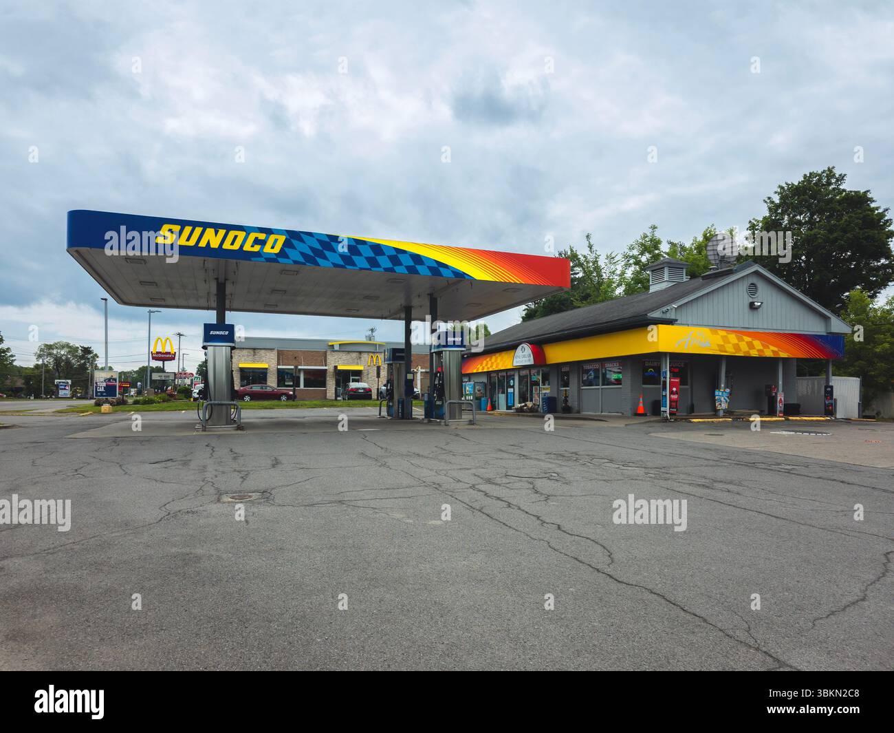 New Hartford, NY - Jun 16, 2025: Ultra-wide view of Sunoco gas station ...